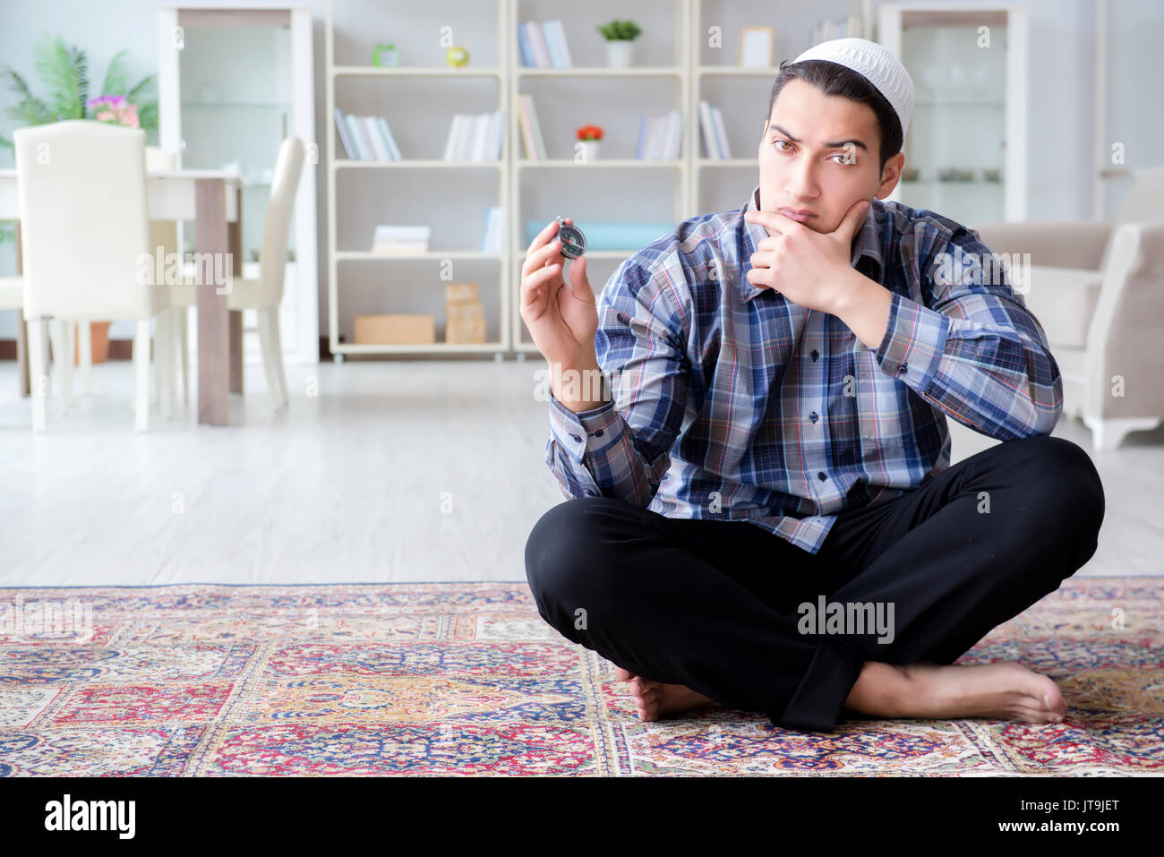 Muslim man praying at home Stock Photo - Alamy