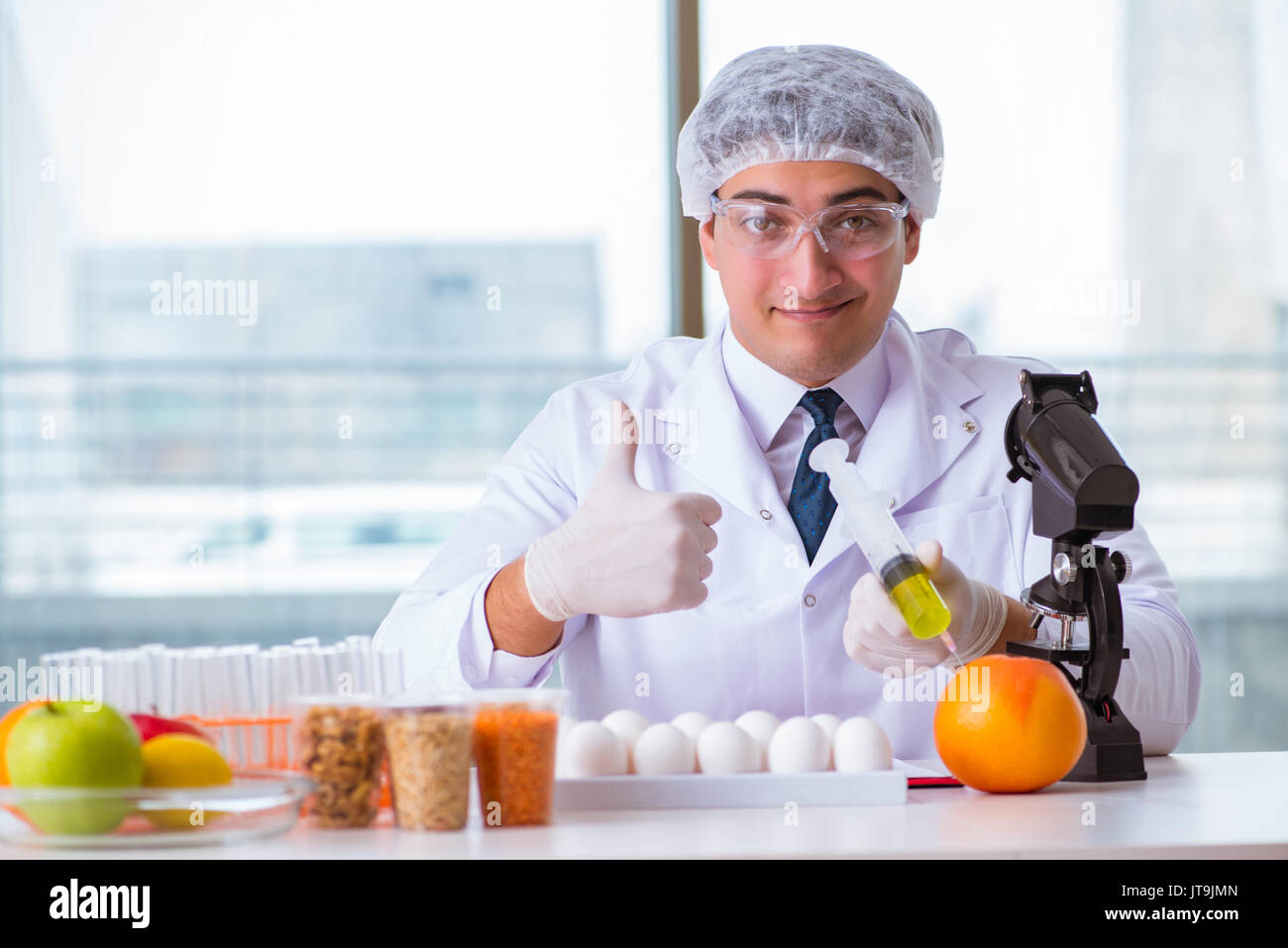 Nutrition expert testing food products in lab Stock Photo - Alamy