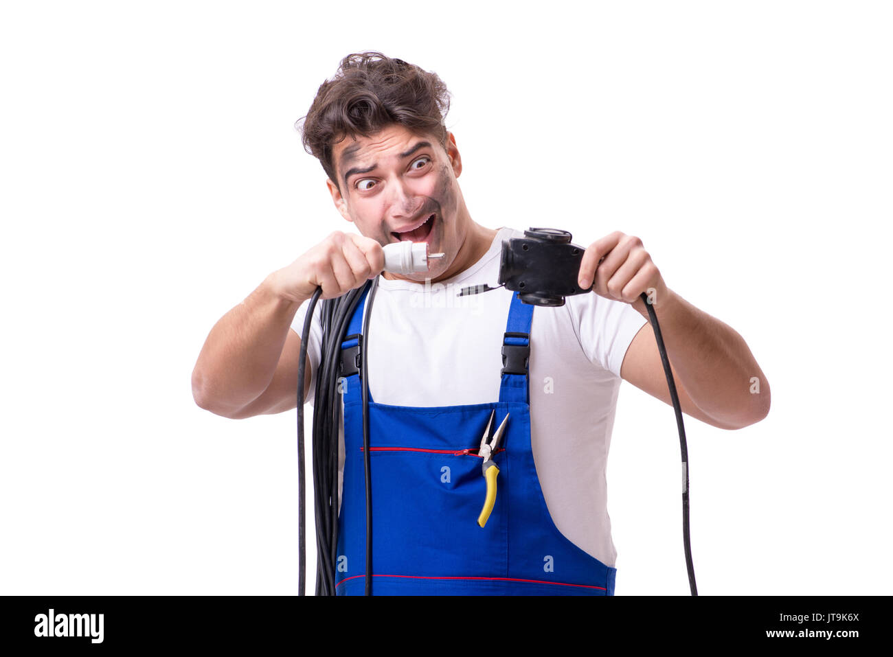 Funny man doing electrical repair Stock Photo - Alamy