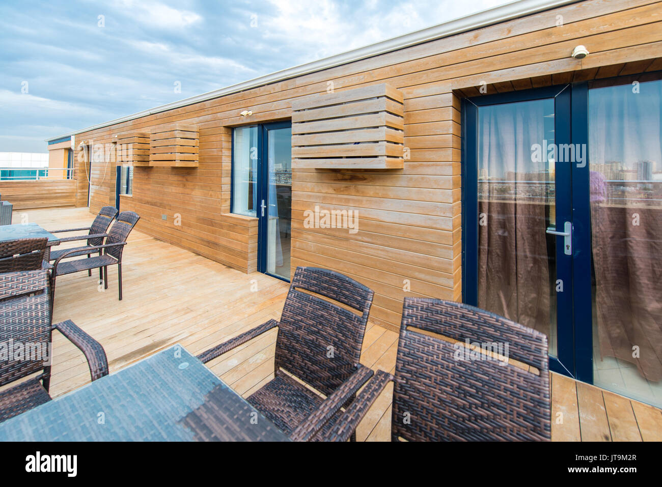 Terrace cafe on top floor Stock Photo - Alamy