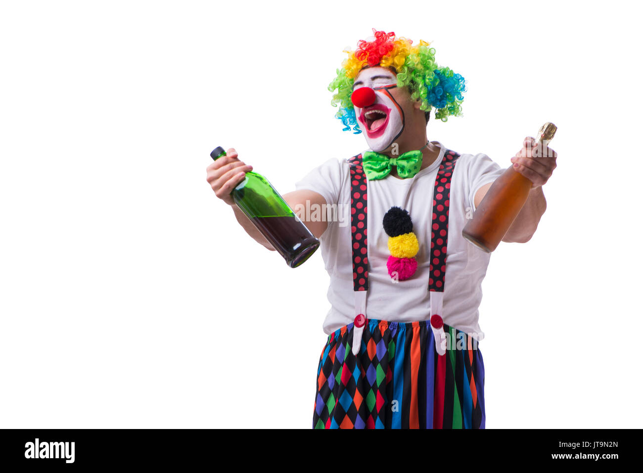 Funny clown with a bottle isolated on white background Stock Photo - Alamy