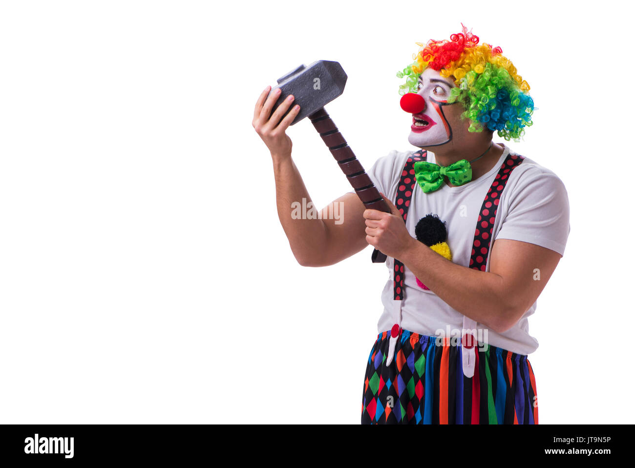 Funny clown with a hammer isolated on white background Stock Photo - Alamy