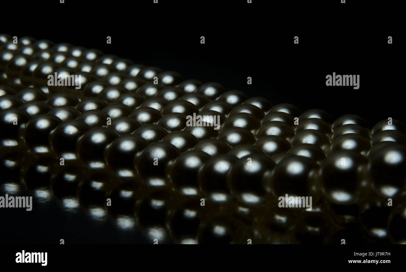 Strings of Black Pearls Stock Photo - Alamy