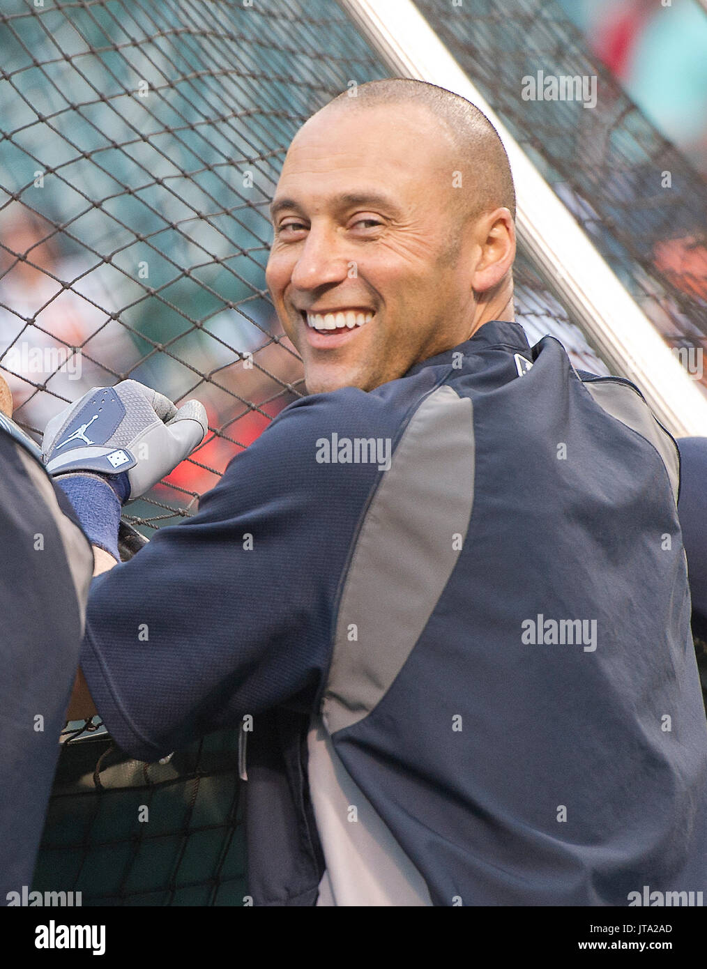 New York Yankees shortstop Derek Jeter (2) smiles at fans calling his ...