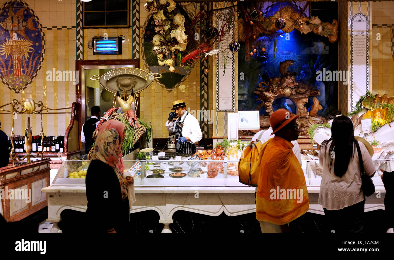London UK - Fresh fish counter in the Food Hall at Harrods Department ...