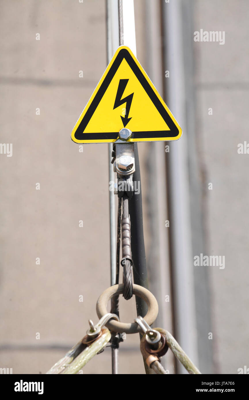 Sign high voltage ona Poer Line Stock Photo - Alamy