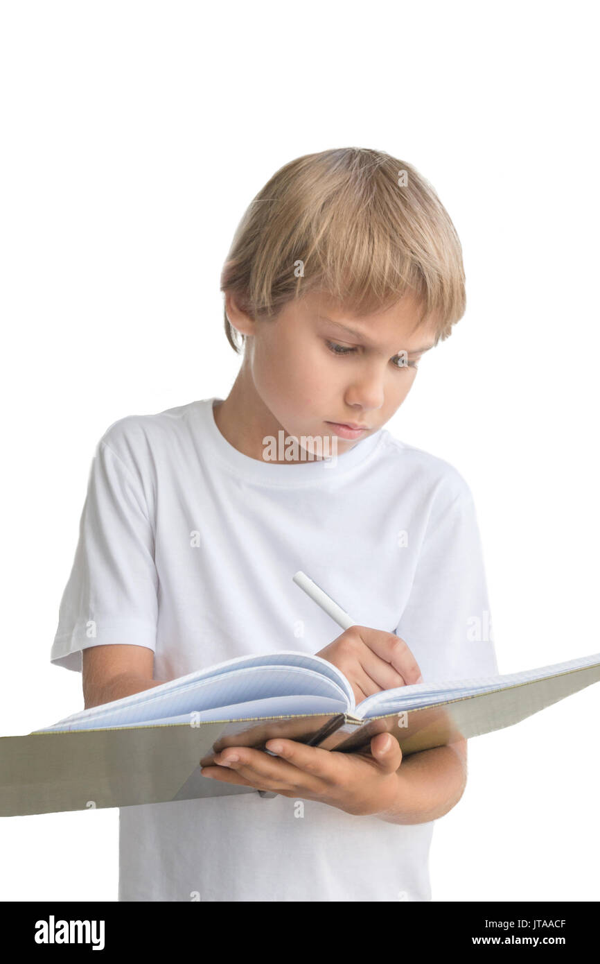 Child with notebook and pen writing something, isolated on white ...