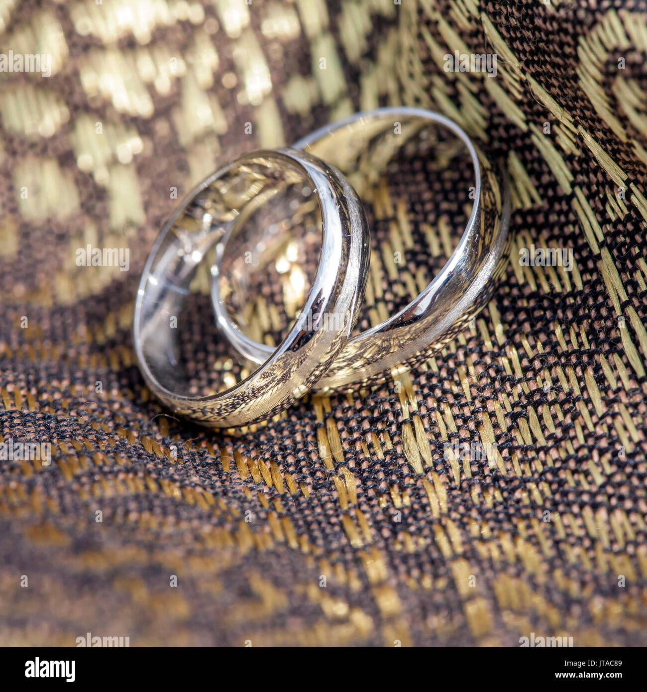 Wedding rings on beautiful background Stock Photo - Alamy