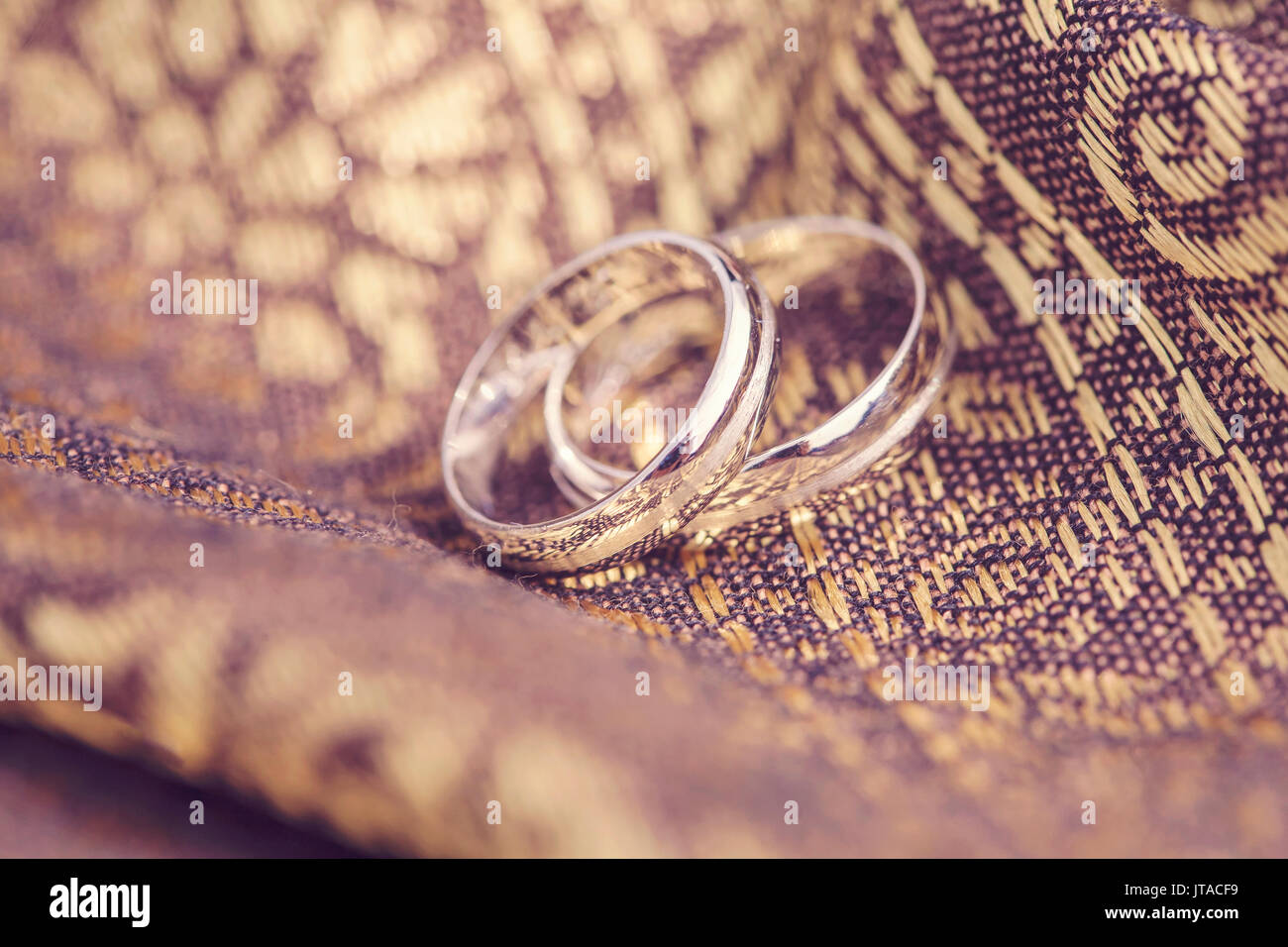 Wedding rings on beautiful background Stock Photo - Alamy