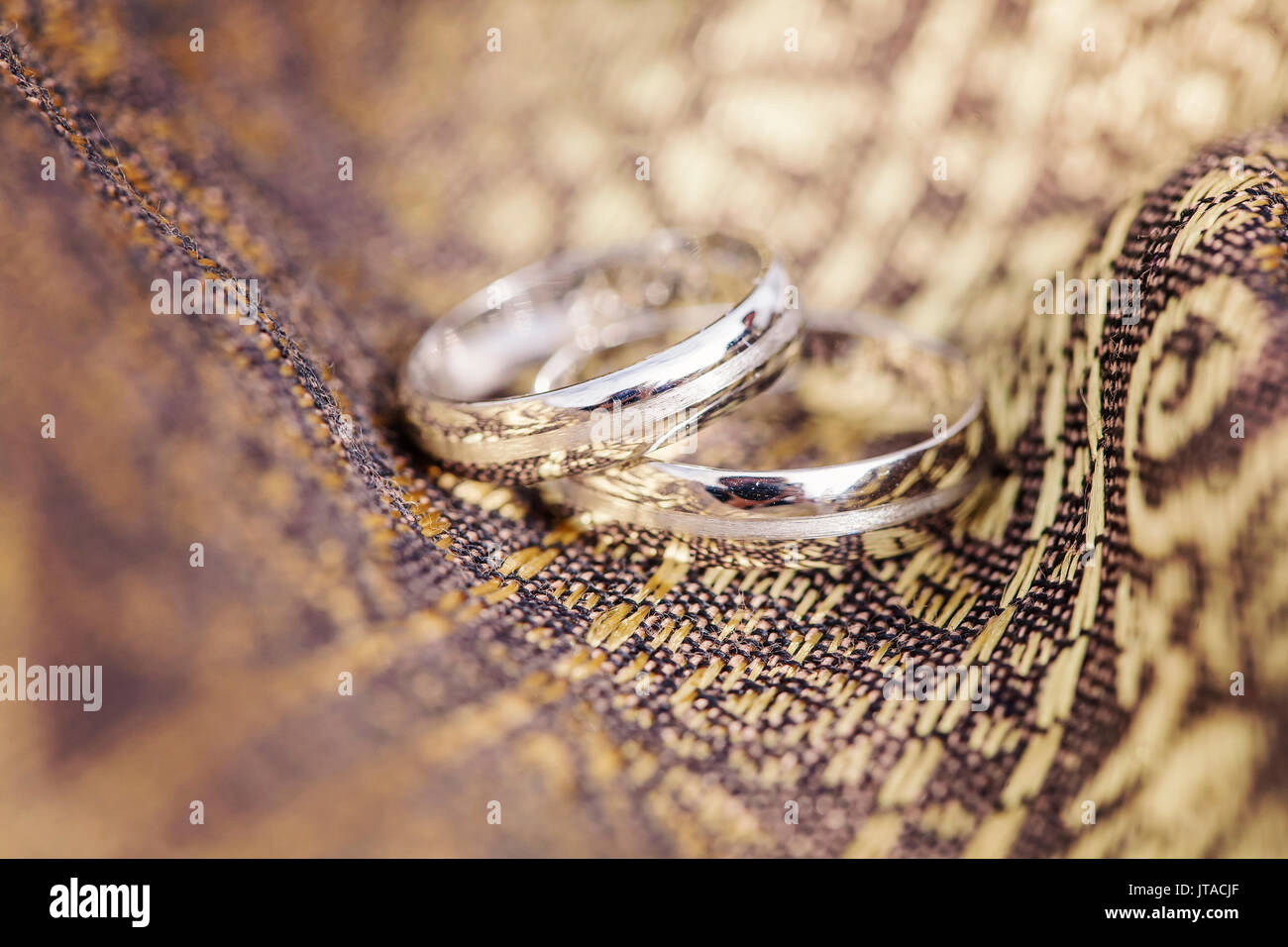 Wedding rings on beautiful background Stock Photo - Alamy