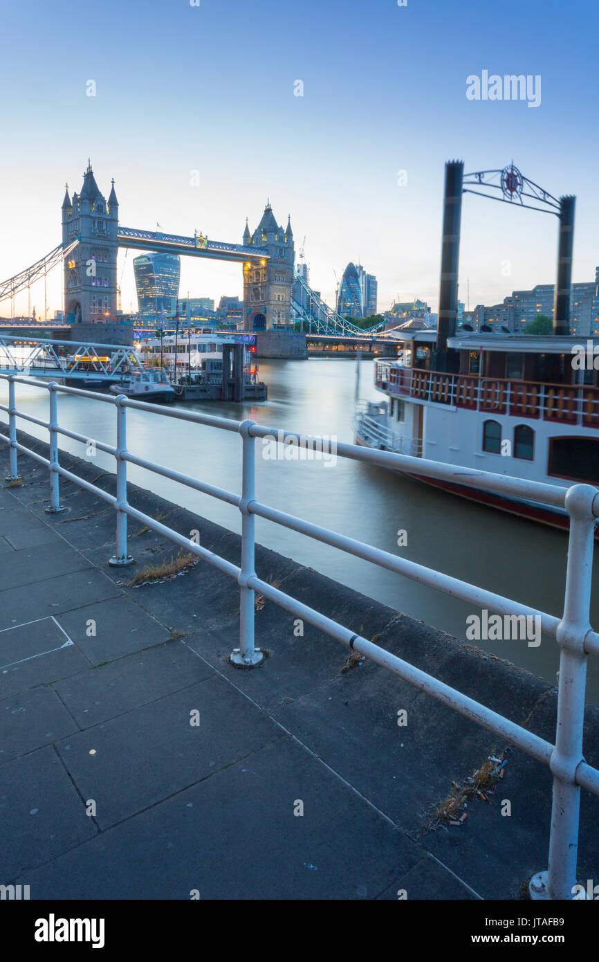 Tower Bridge, traditional riverboat and City of London skyline from ...