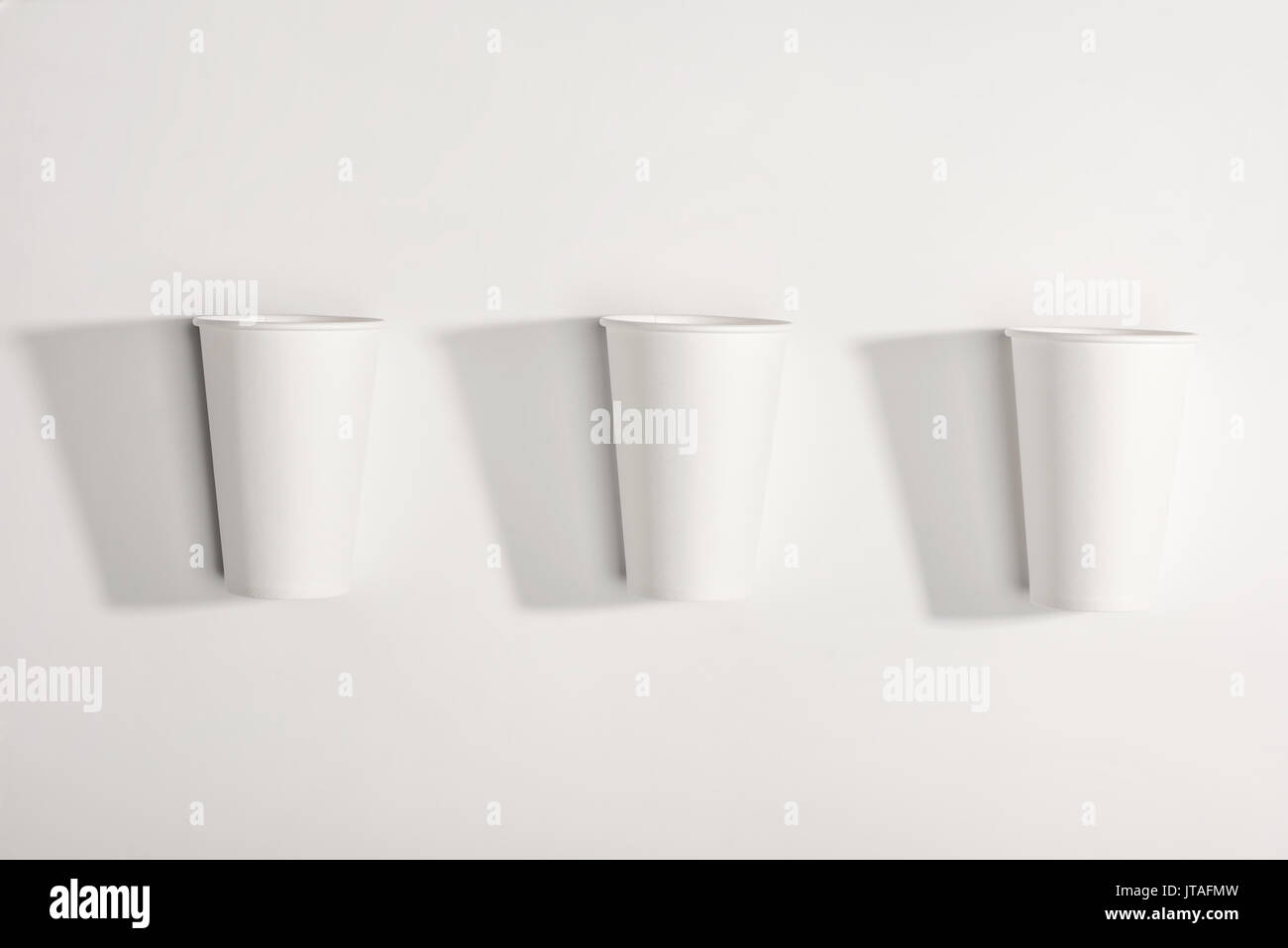 top view of white disposable paper cups isolated on white Stock Photo ...