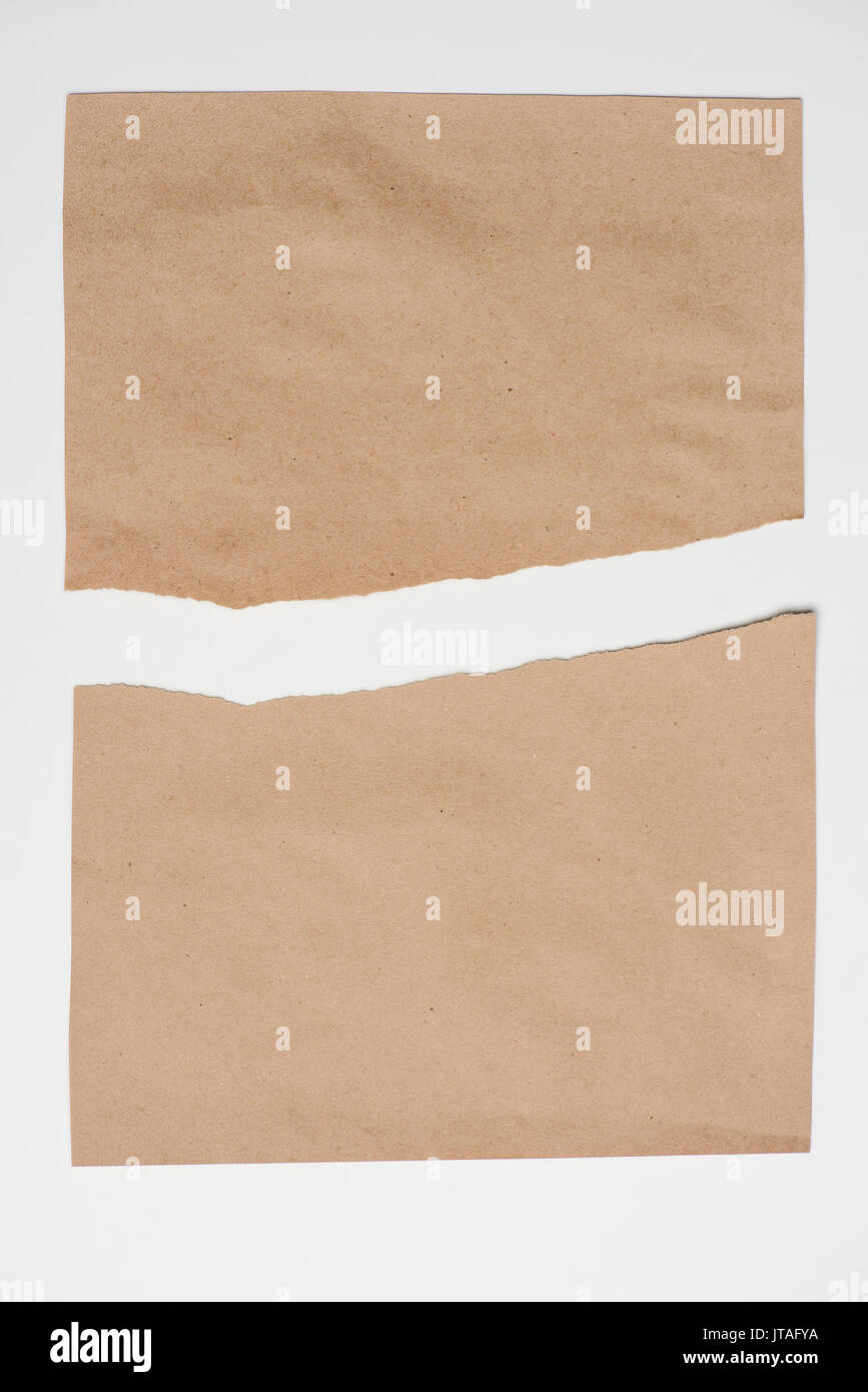 top view of ripped paper sheet isolated on white Stock Photo - Alamy