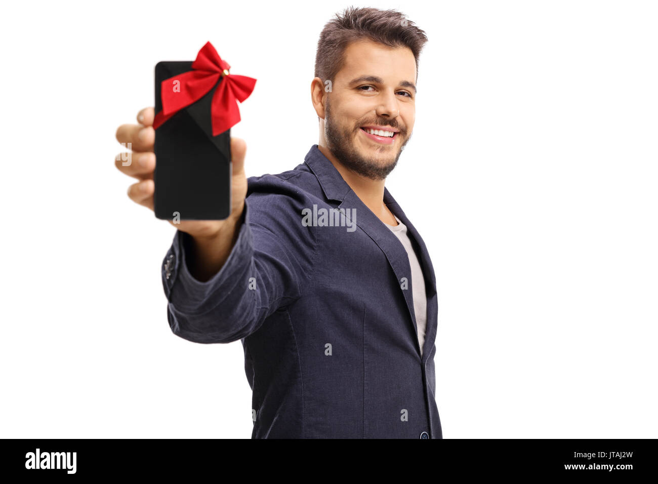 Elegant guy showing a phone wrapped with red ribbon as a present and ...