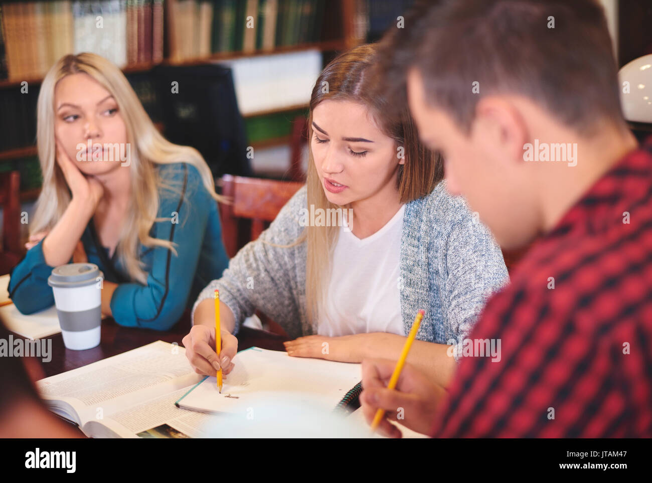 College campus studying in library Stock Photo - Alamy