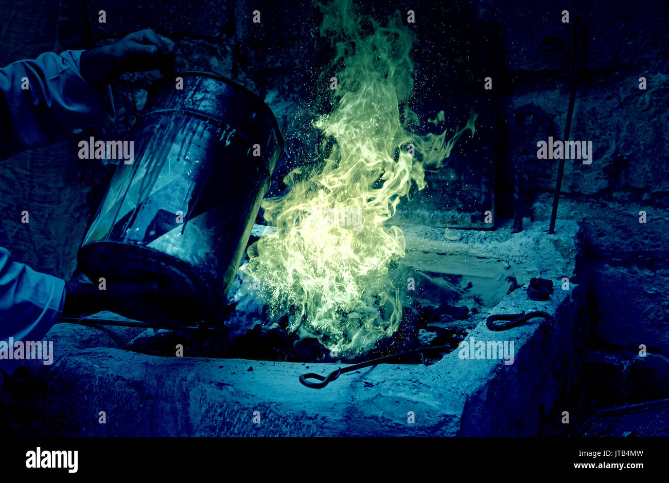 Extinguishing flames with water in the carbon, safety detail Stock ...