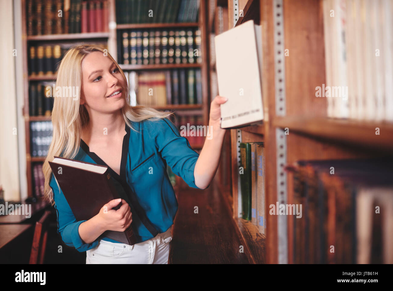 Browsing publication hi-res stock photography and images - Alamy