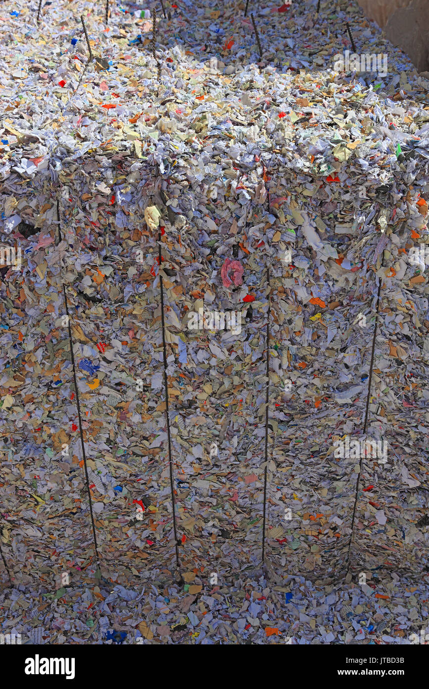 Waste paper, shredded waste paper in a recycling company, paper flakes ...