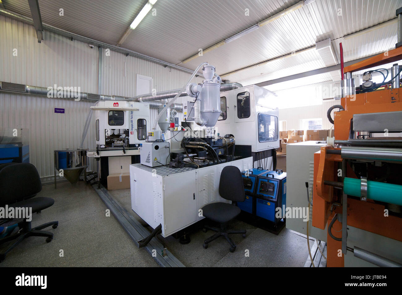 Production tape in a small factory Stock Photo - Alamy