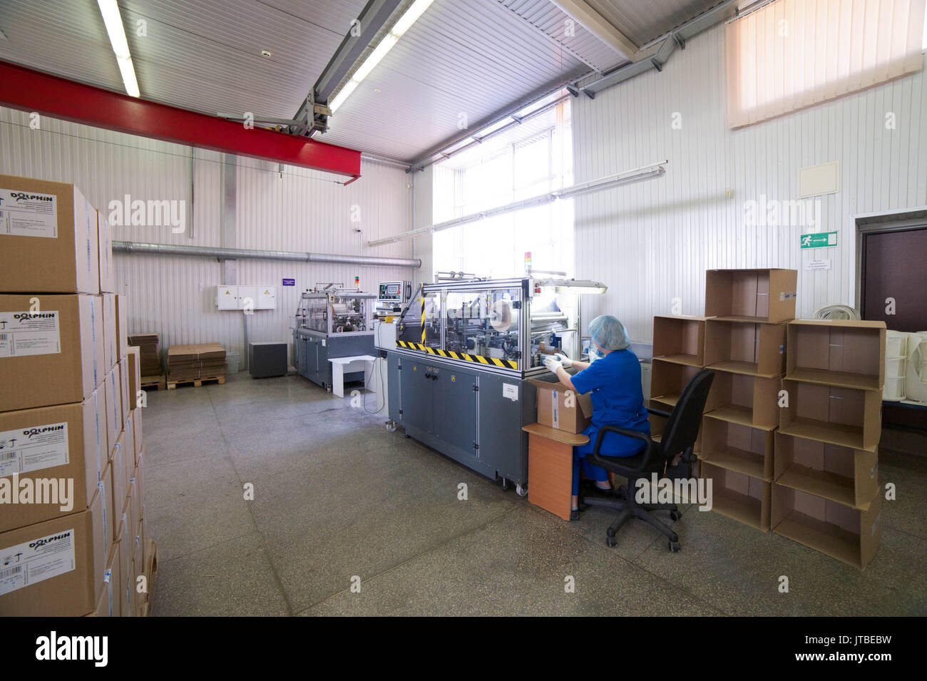 Production tape in a small factory Stock Photo - Alamy