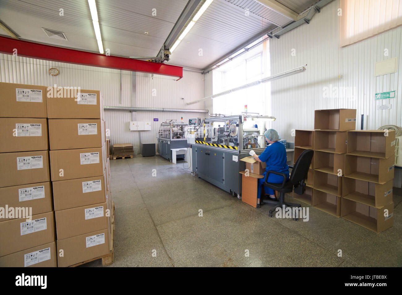 Production tape in a small factory Stock Photo - Alamy