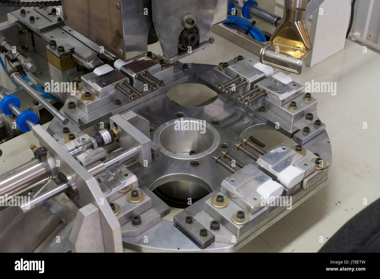 Production tape in a small factory Stock Photo - Alamy