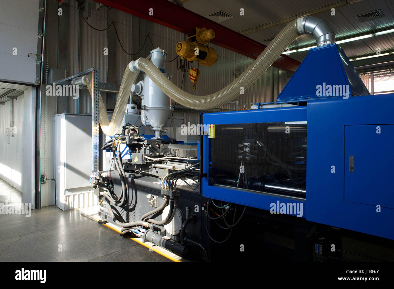 Production tape in a small factory Stock Photo - Alamy