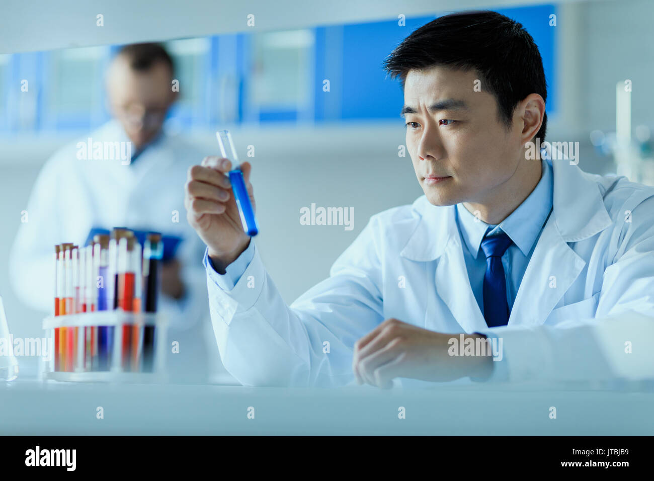 Focused scientist hi-res stock photography and images - Alamy
