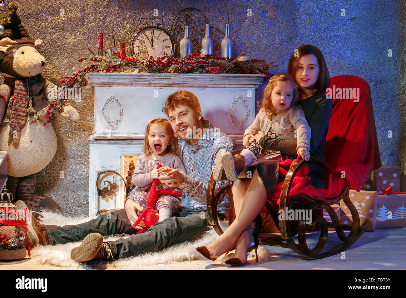 Loving family with two children Stock Photo - Alamy