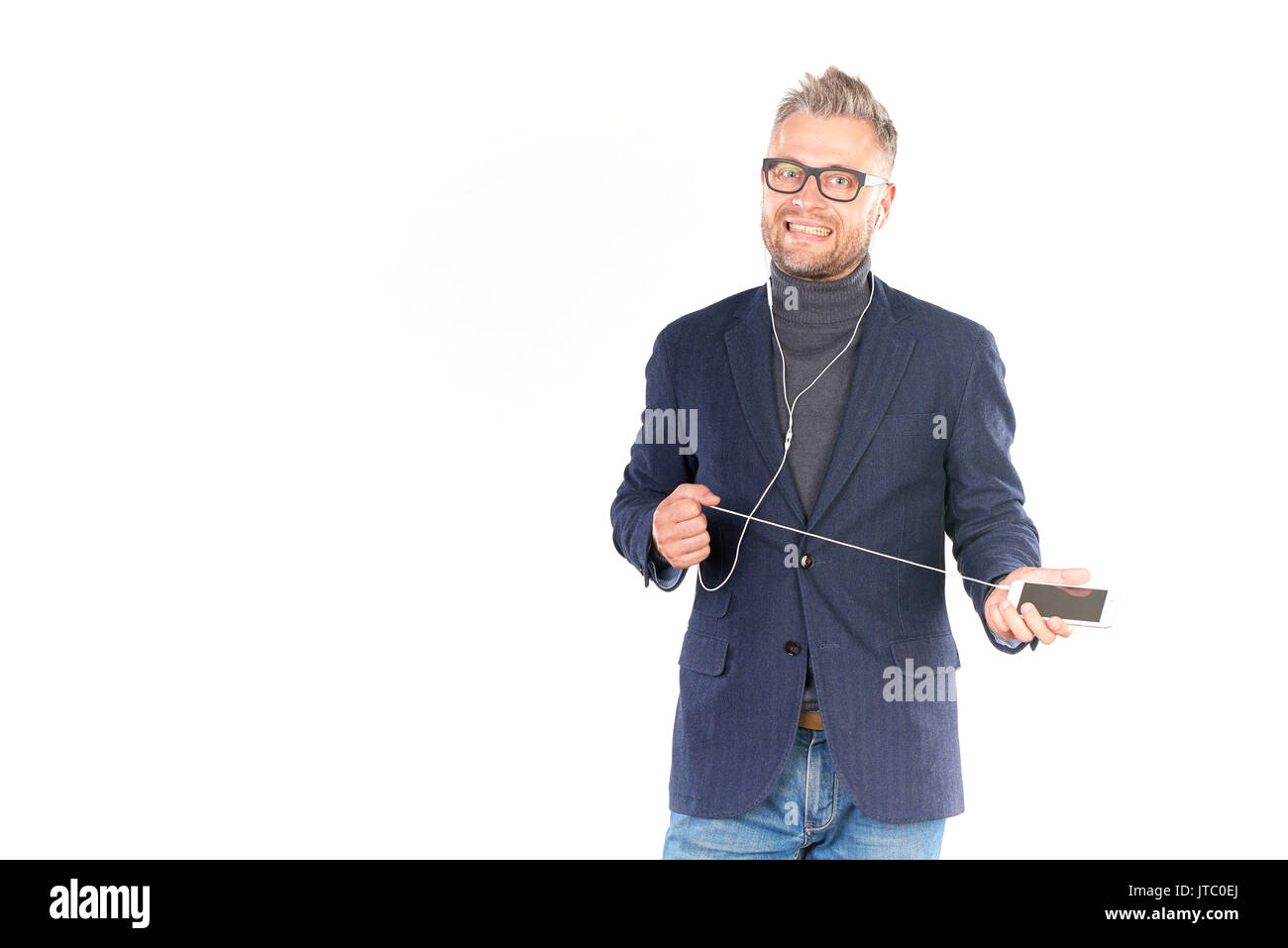 Listening music using smartphone Cut Out Stock Images & Pictures - Alamy