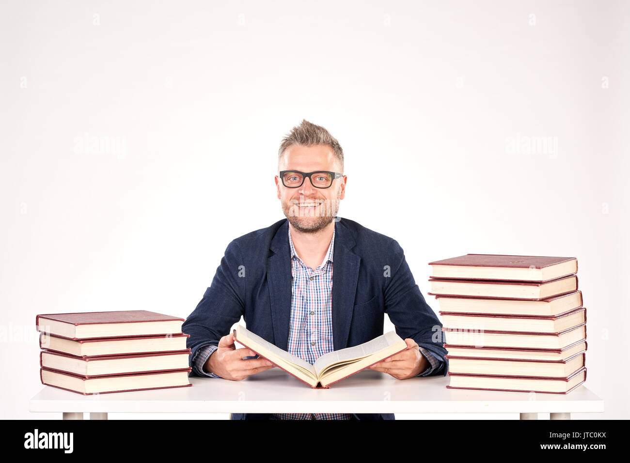 College university professor sitting hi-res stock photography and ...