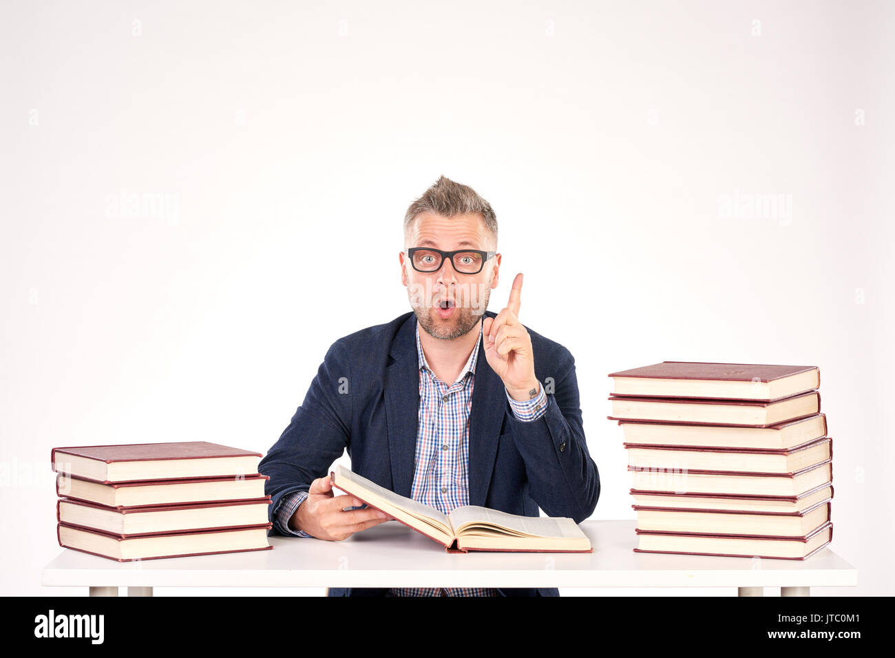 Professor student talking desk hi-res stock photography and images - Alamy