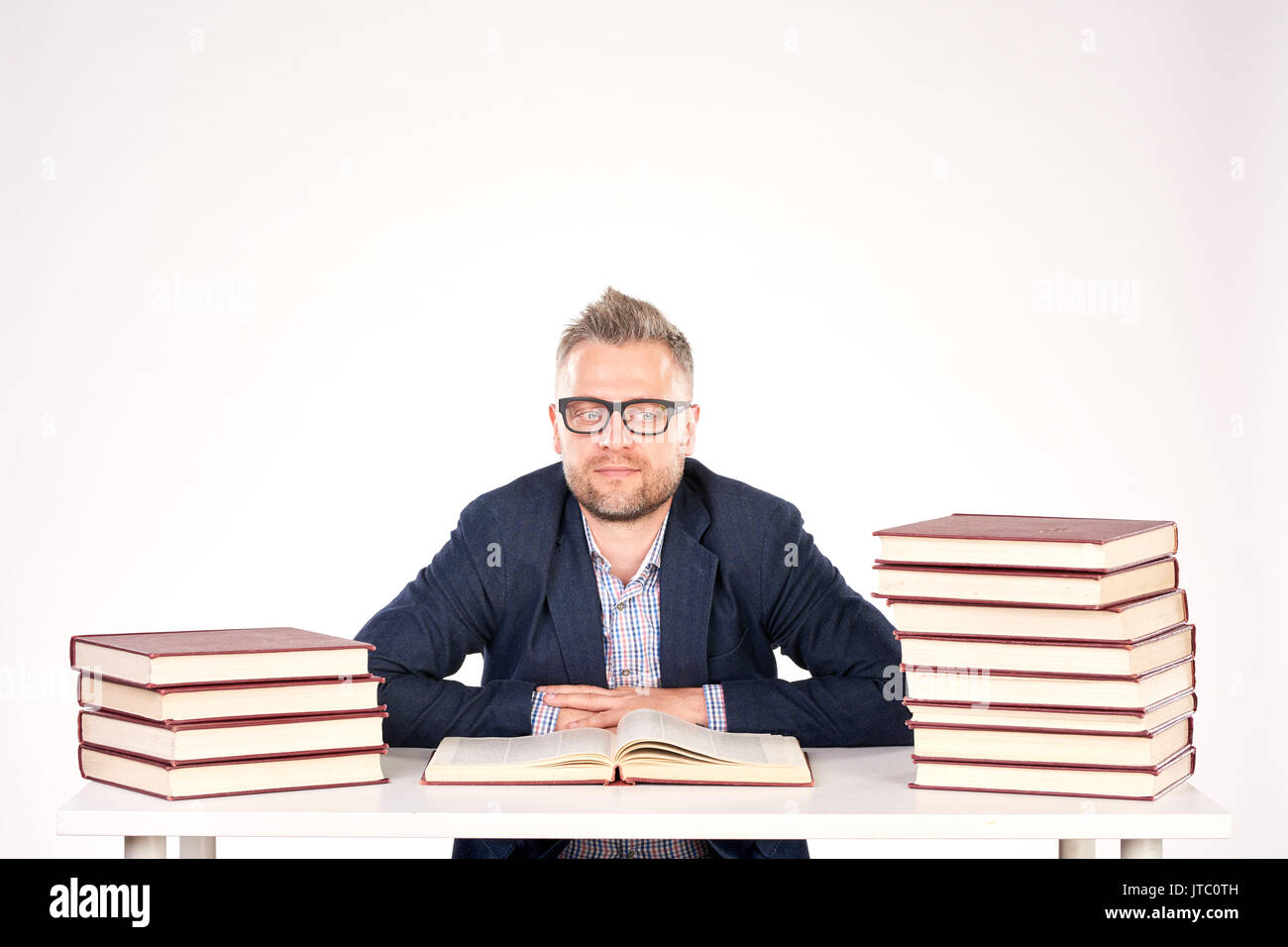 Pensive professor desk hi-res stock photography and images - Alamy