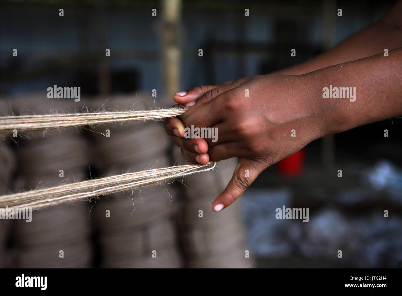 A child labour working in a rope manufacturing factory at Keraniganj in ...