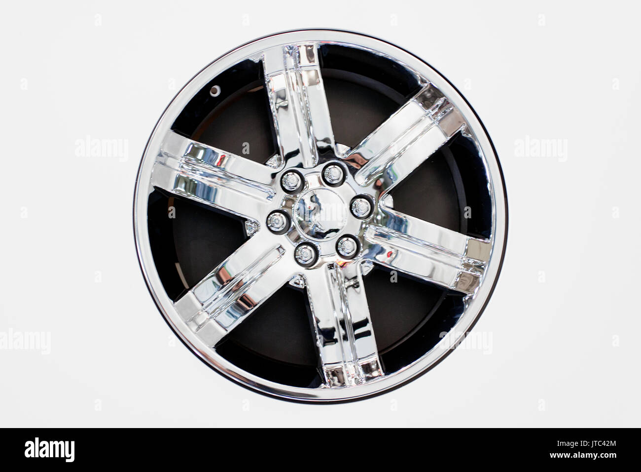 Car steel rim on the wall Stock Photo - Alamy