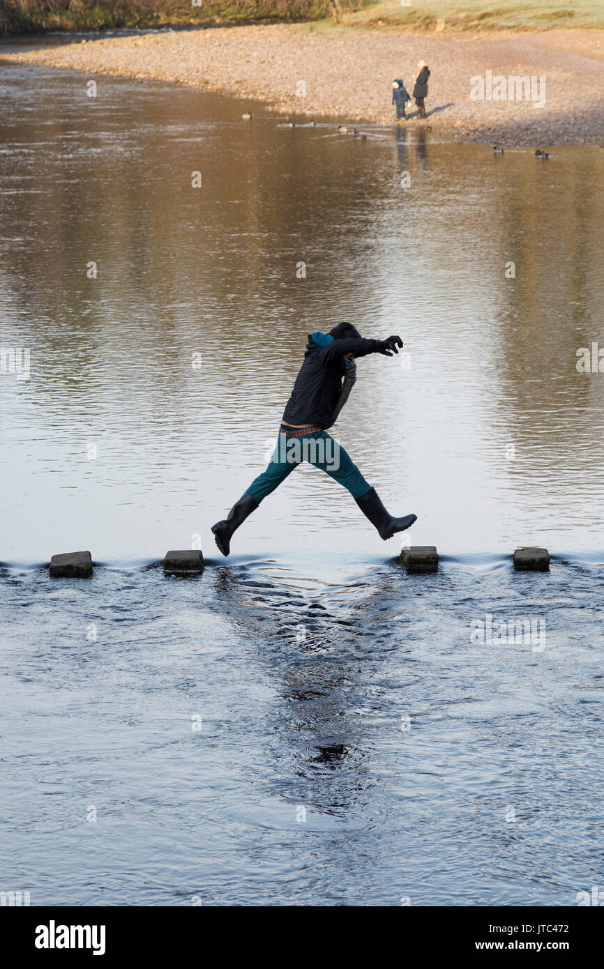 Man jump over river hi-res stock photography and images - Alamy