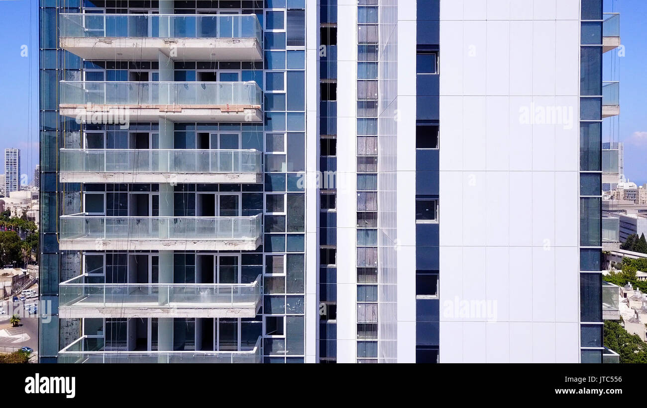 New Skyscraper building in final construction stage Stock Photo - Alamy