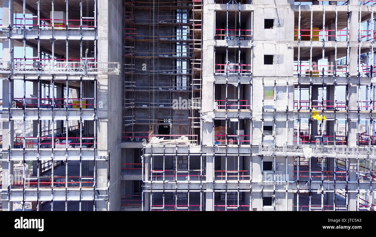 New Skyscraper building in final construction stage Stock Photo - Alamy