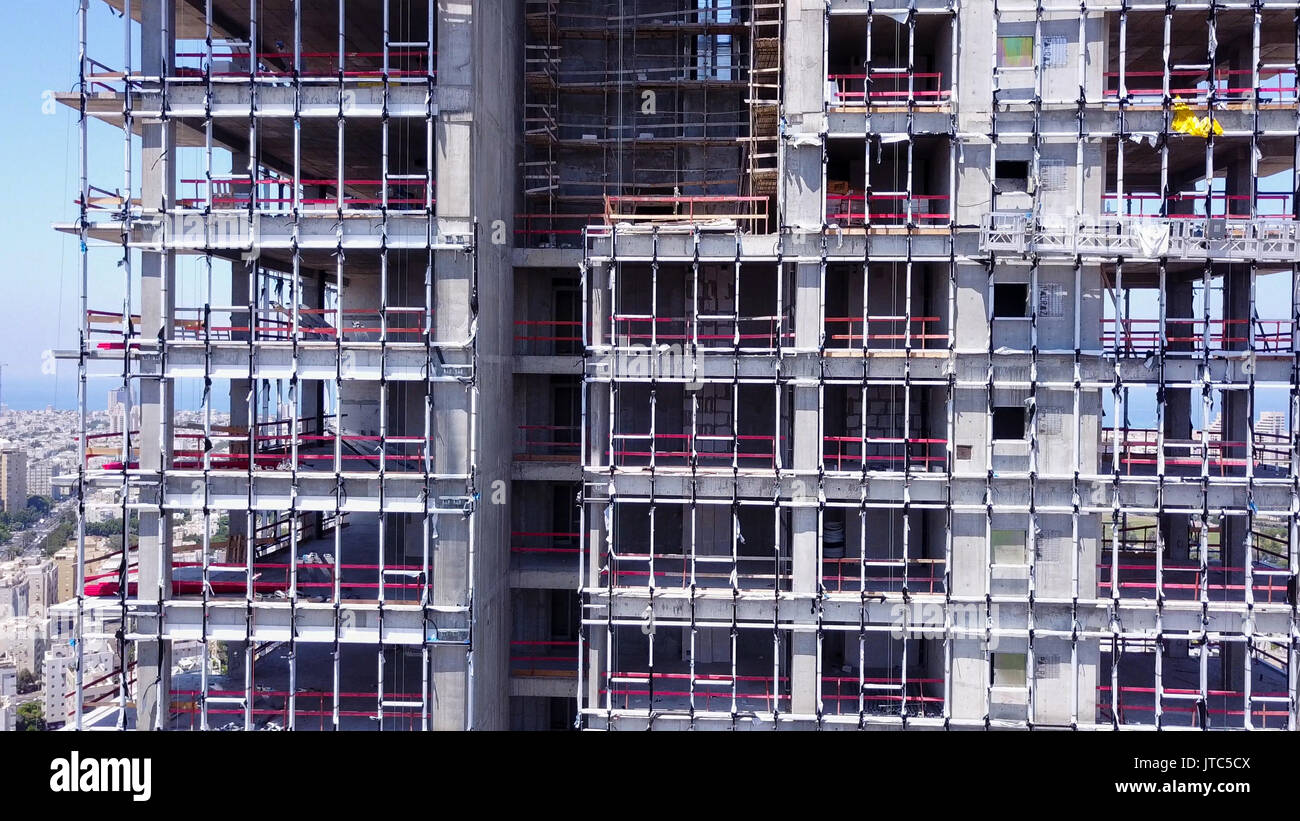 New Skyscraper building in final construction stage Stock Photo - Alamy
