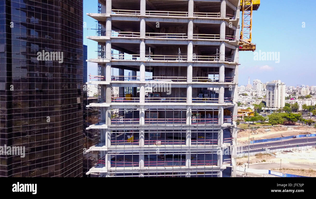 New Skyscraper building in final construction stage Stock Photo - Alamy