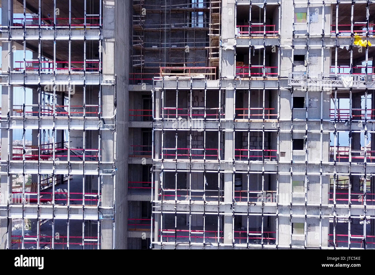 New Skyscraper building in final construction stage Stock Photo - Alamy