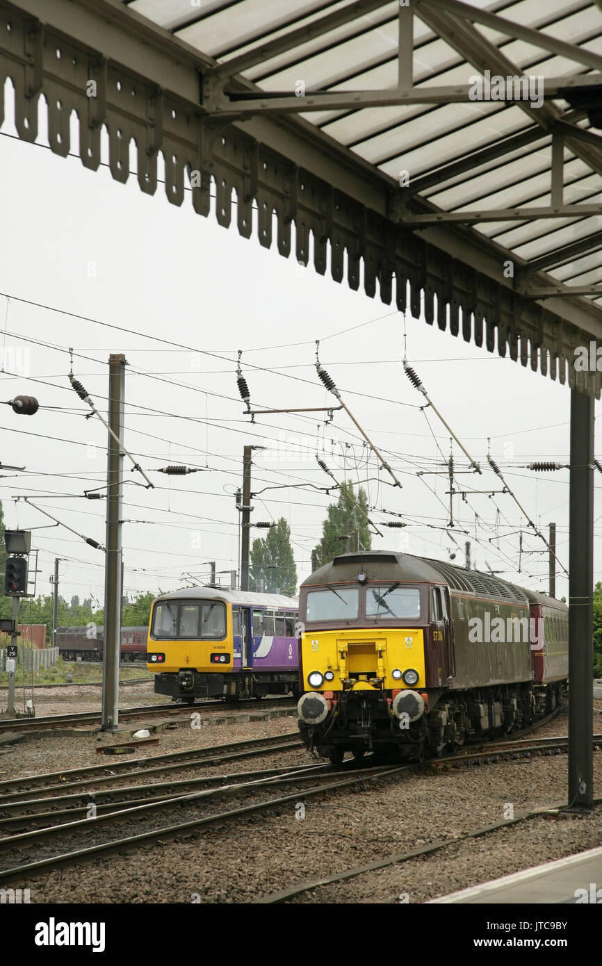 Class 57 diesel locomotive approaching York station with southbound ...