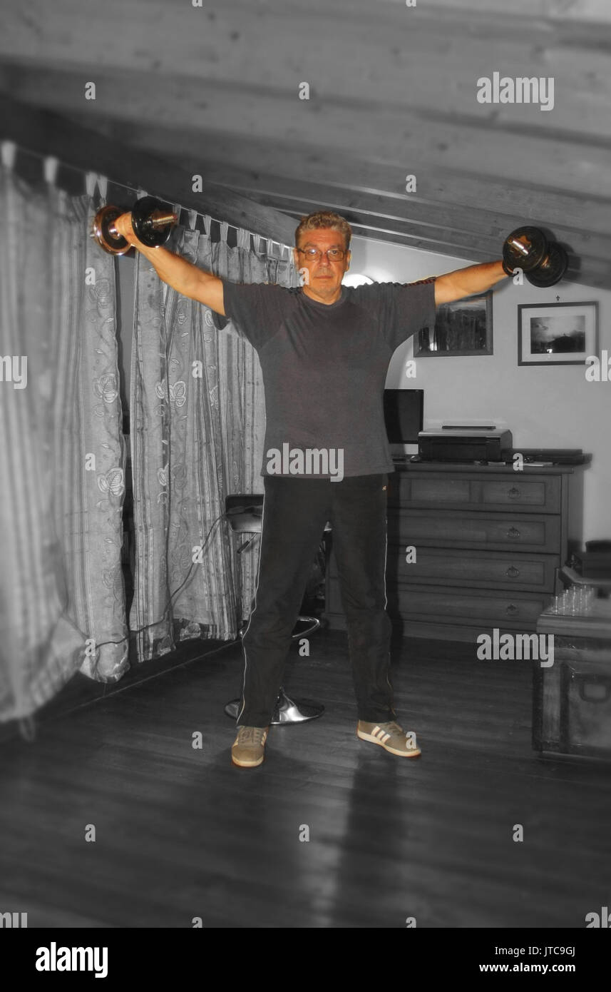 Home gym in the attic, shoulder side up Stock Photo - Alamy