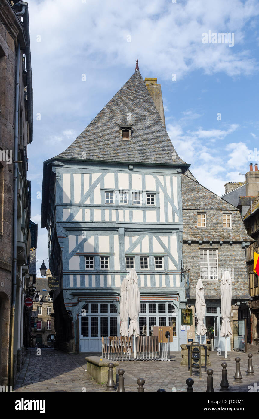 Old timber framed buildings in the historic walled town of Dinan in ...