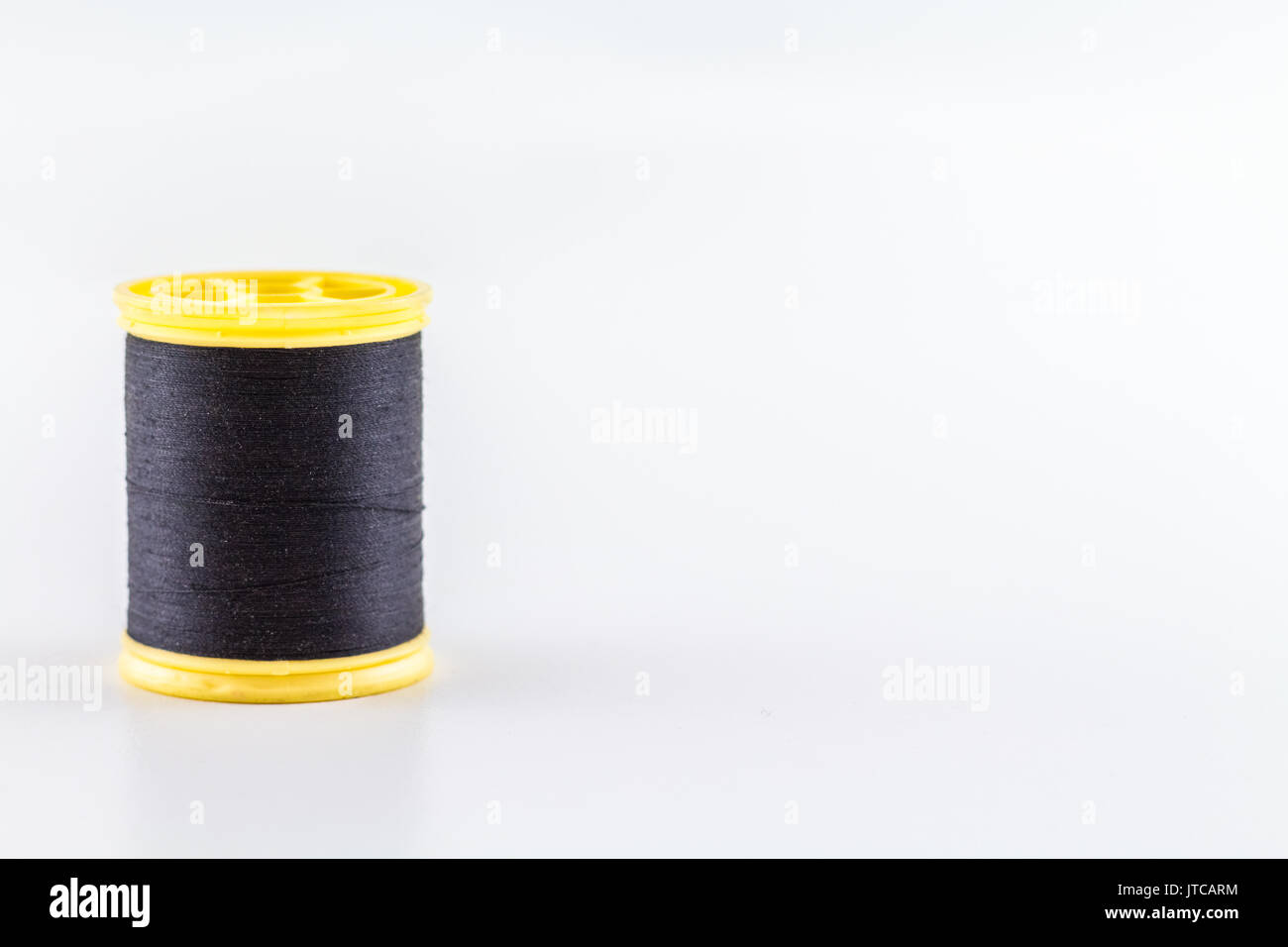 Spools of Needle and Thread. Sewing Tools Stock Photo - Alamy