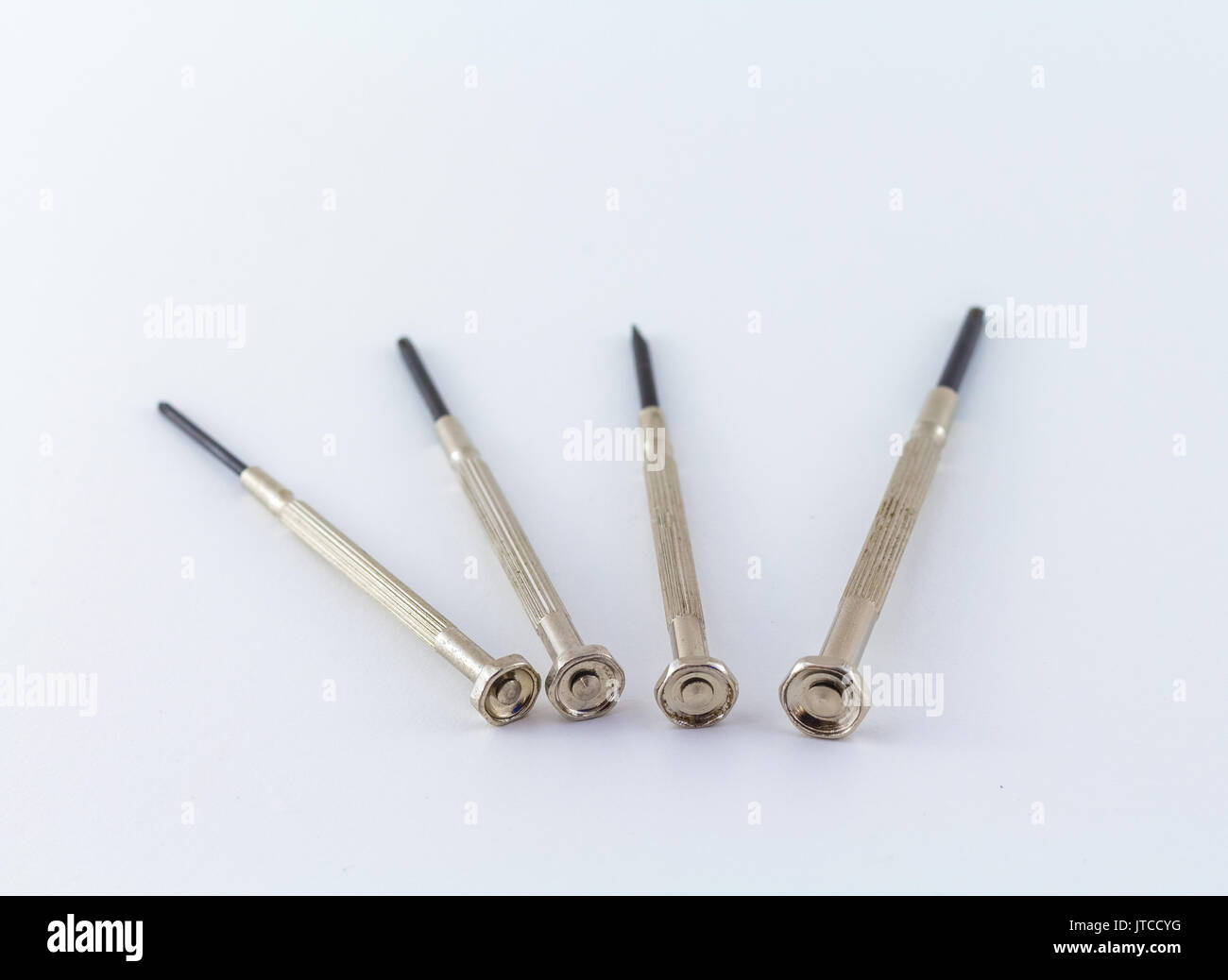 screwdriver mini tool on a white background chromed steel with ...