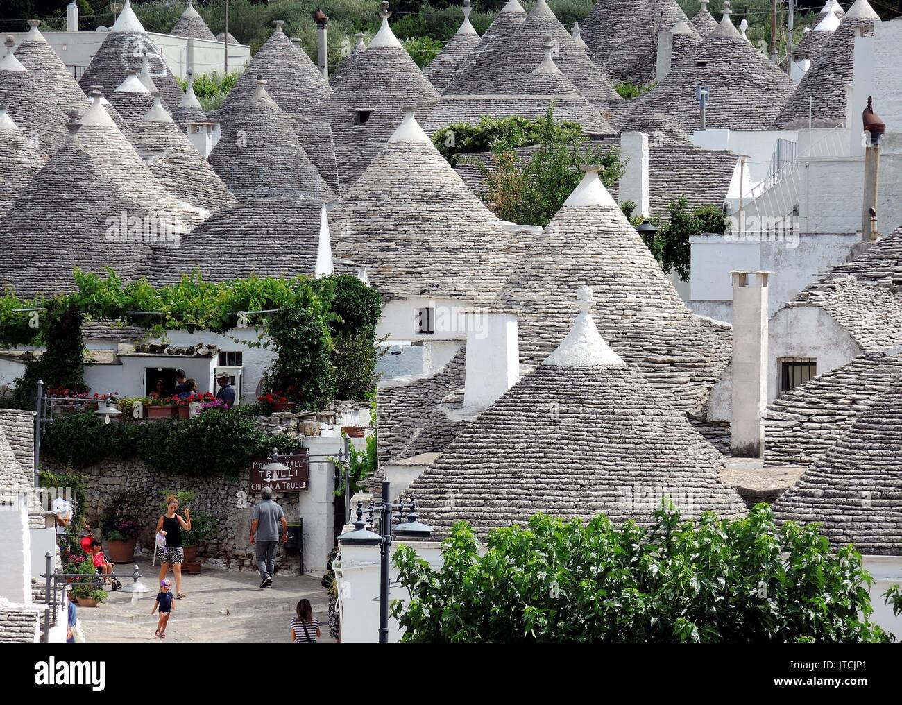 Trullo buildings in the small town Alberobello in Apulia (Italy ...