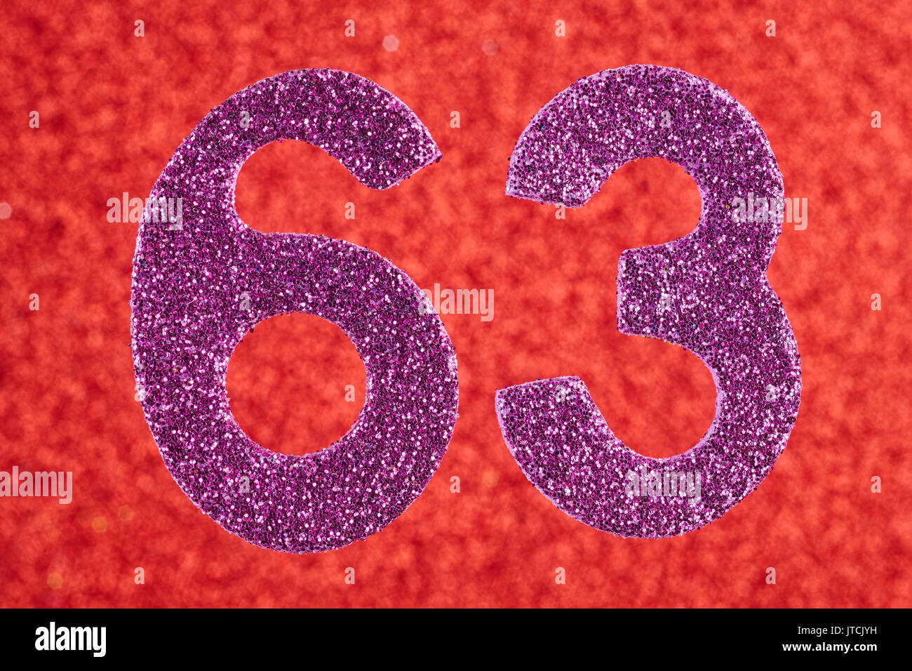 Number sixty-three purple color over a red background. Anniversary ...
