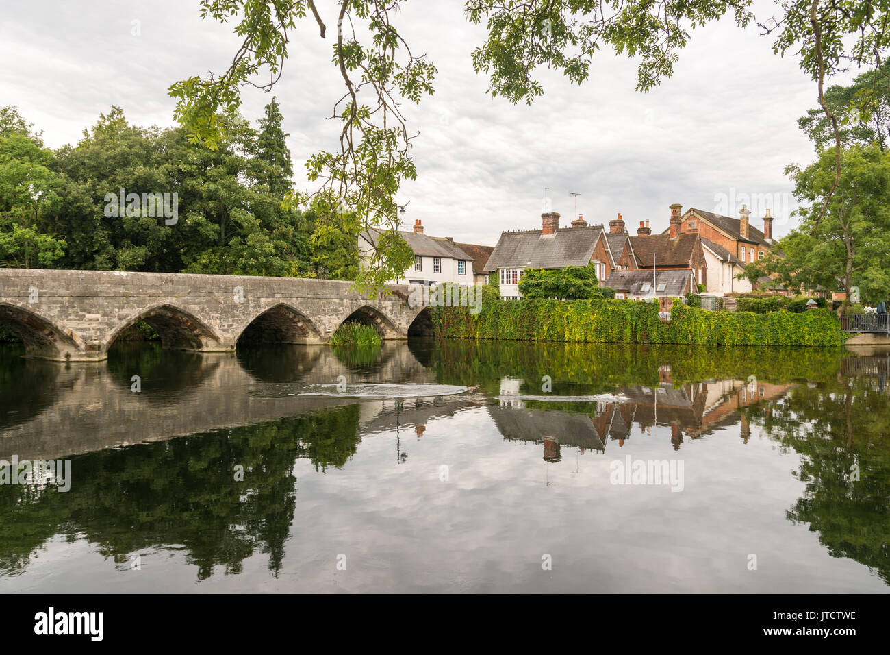 Looking out over the River Avon and the ancient arched bridge of ...