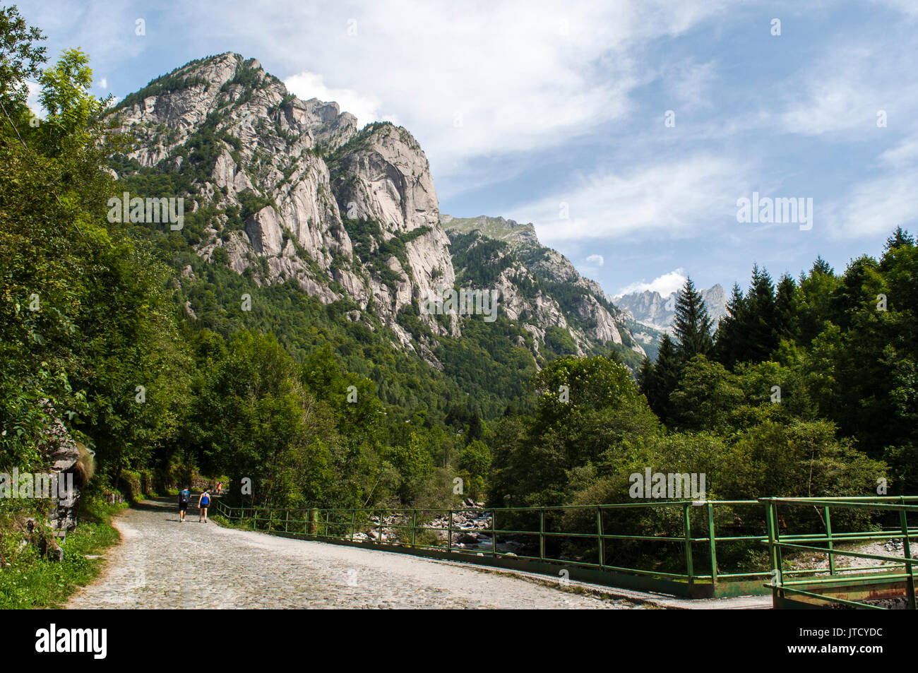 View of the Mello Valley, Val di Mello, a green valley surrounded by ...
